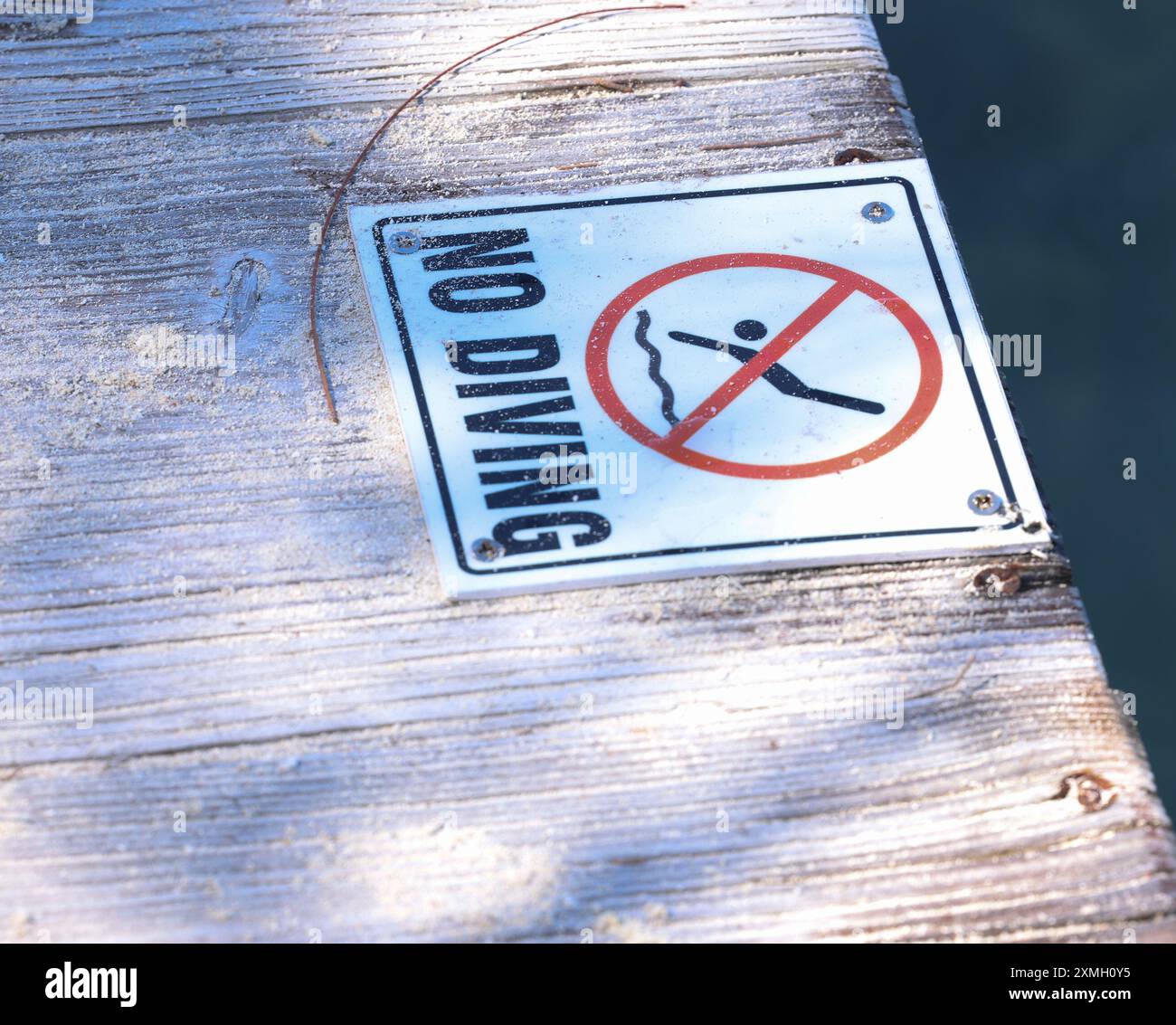 Jumping on wooden dock hi-res stock photography and images - Alamy