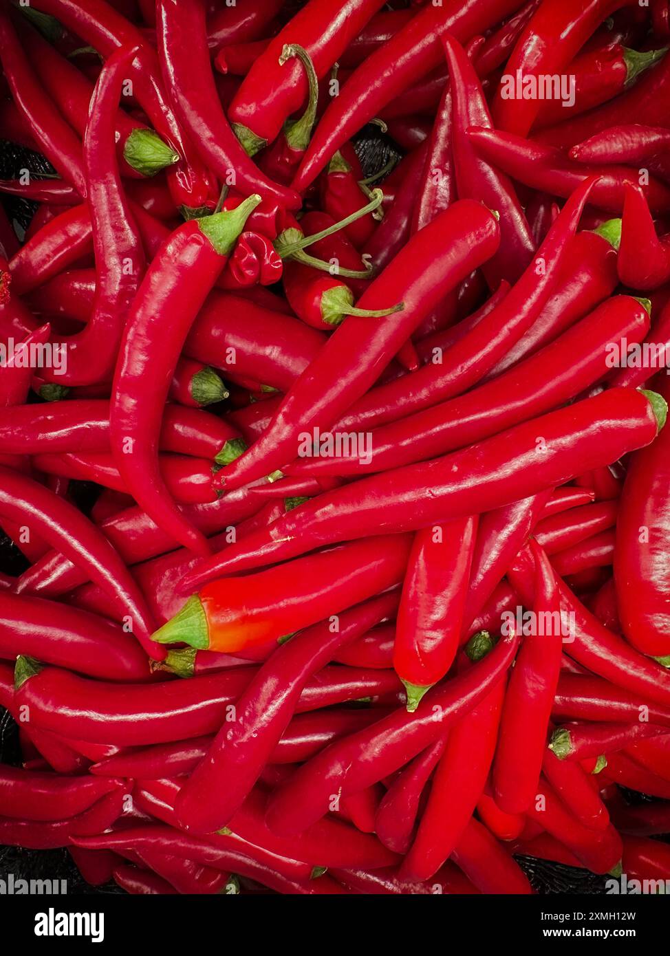 Red hot chilli peppers pattern texture background. Close up. Landscape ...