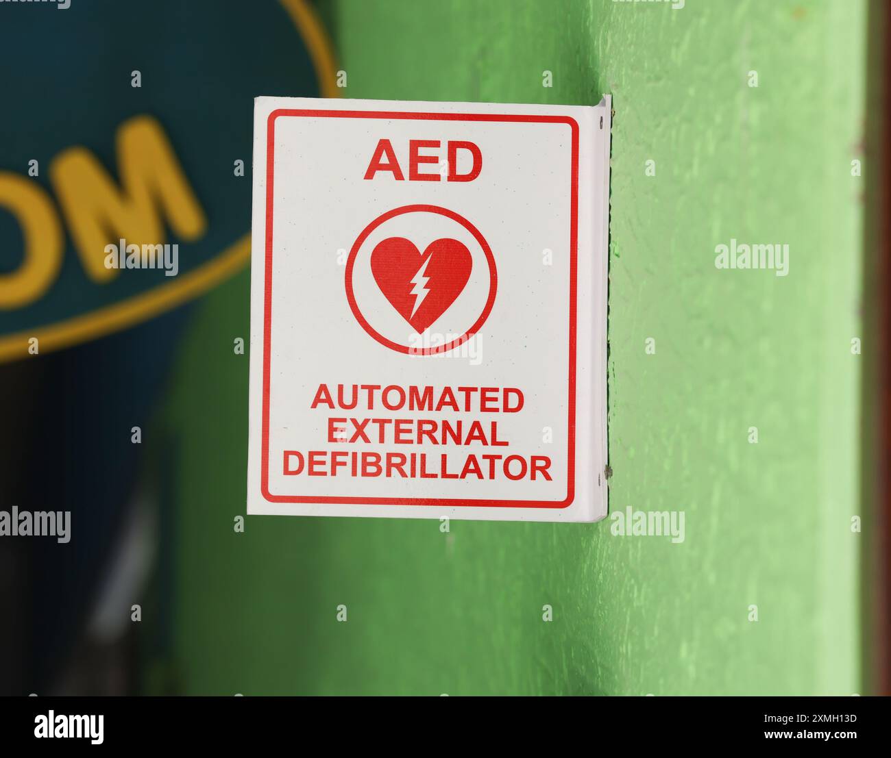 Electric defibrillator logo on a sign in an urban environment ...