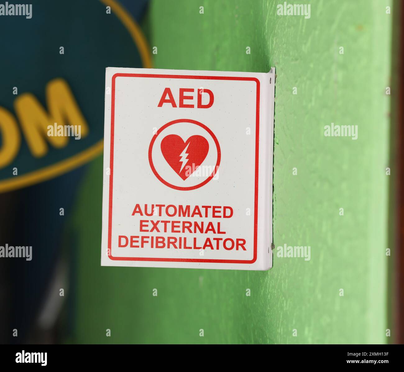 Electric defibrillator logo on a sign in an urban environment ...