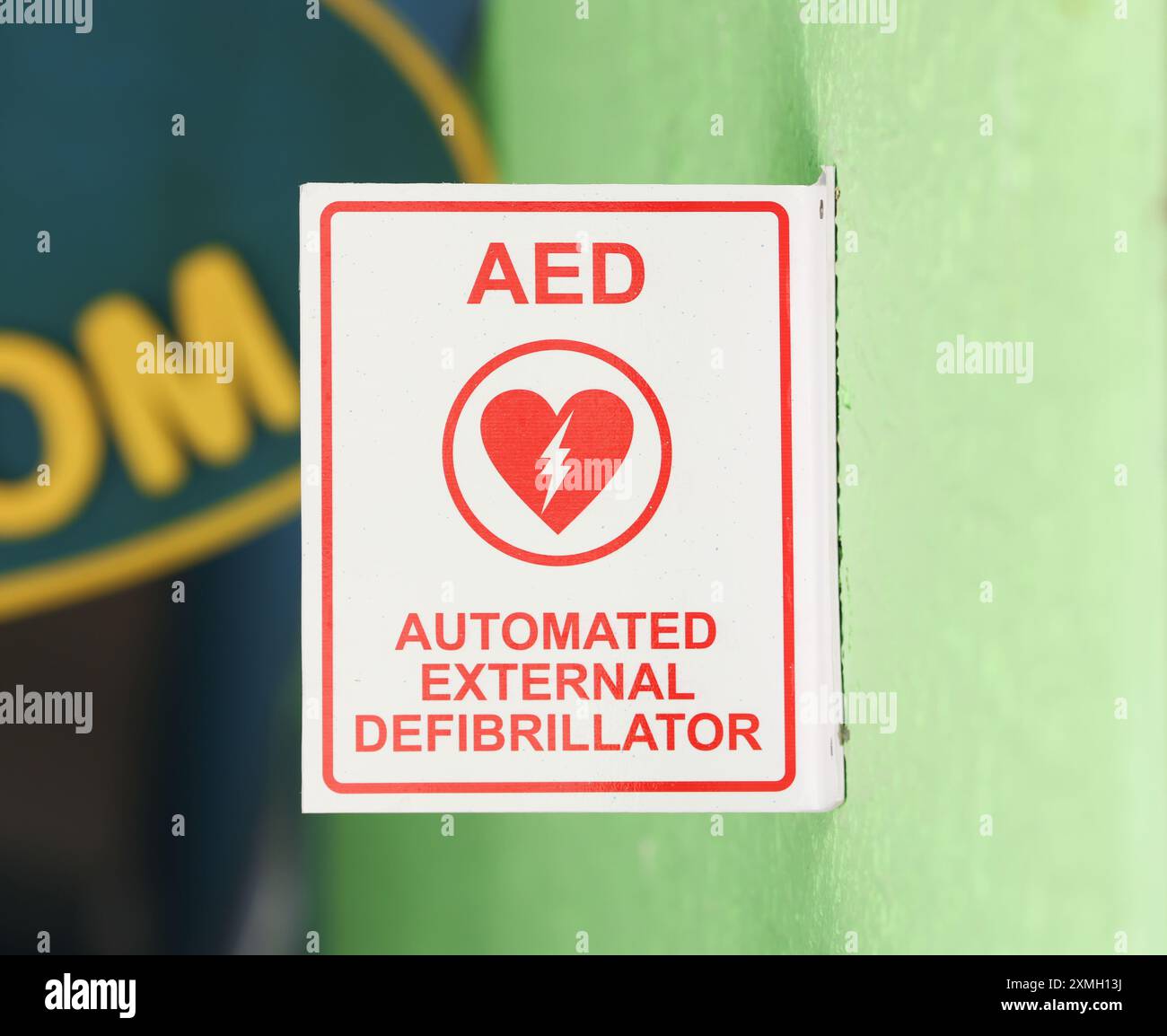Electric defibrillator logo on a sign in an urban environment ...