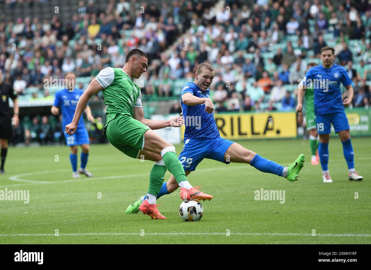 Lewis miller of hibernian with cieran dunne of peterhead hi-res stock ...