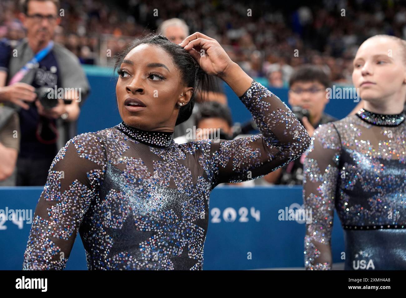 Simone Biles of United States, waits for results after competing on the ...