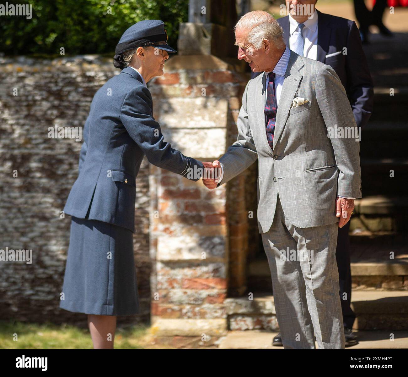King Charles III greets Flight Lieutenant Pauline Petch, who has ...