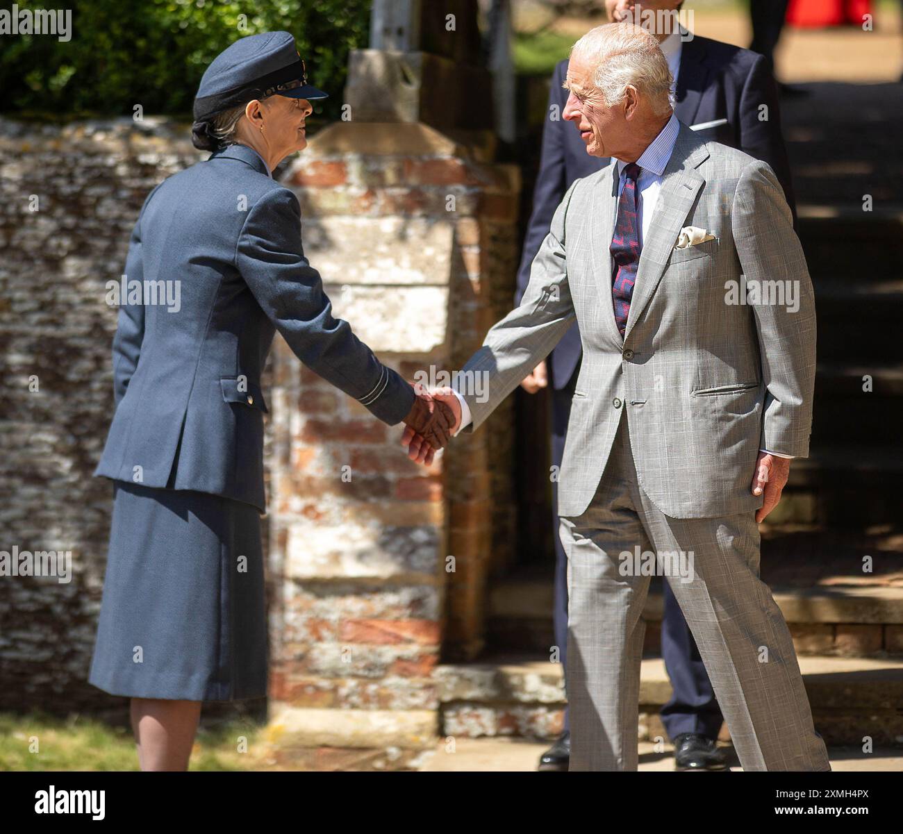 King Charles III greets Flight Lieutenant Pauline Petch, who has ...