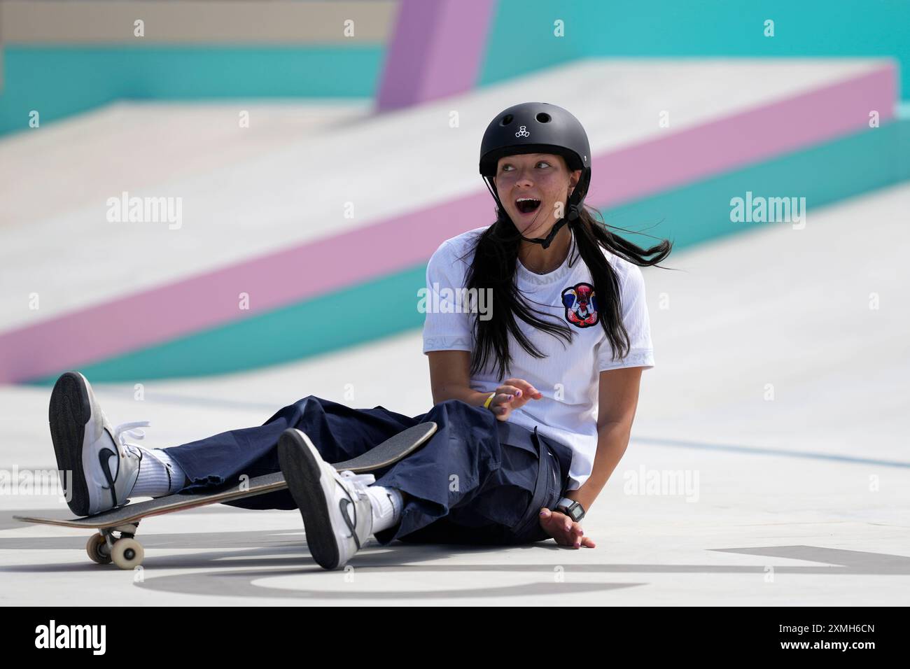Paige Heyn, of the United States, crashes during the women's skateboard ...