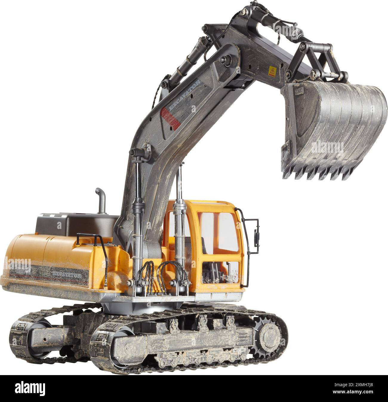 A very realistic yellow scale toy excavator Stock Photo - Alamy