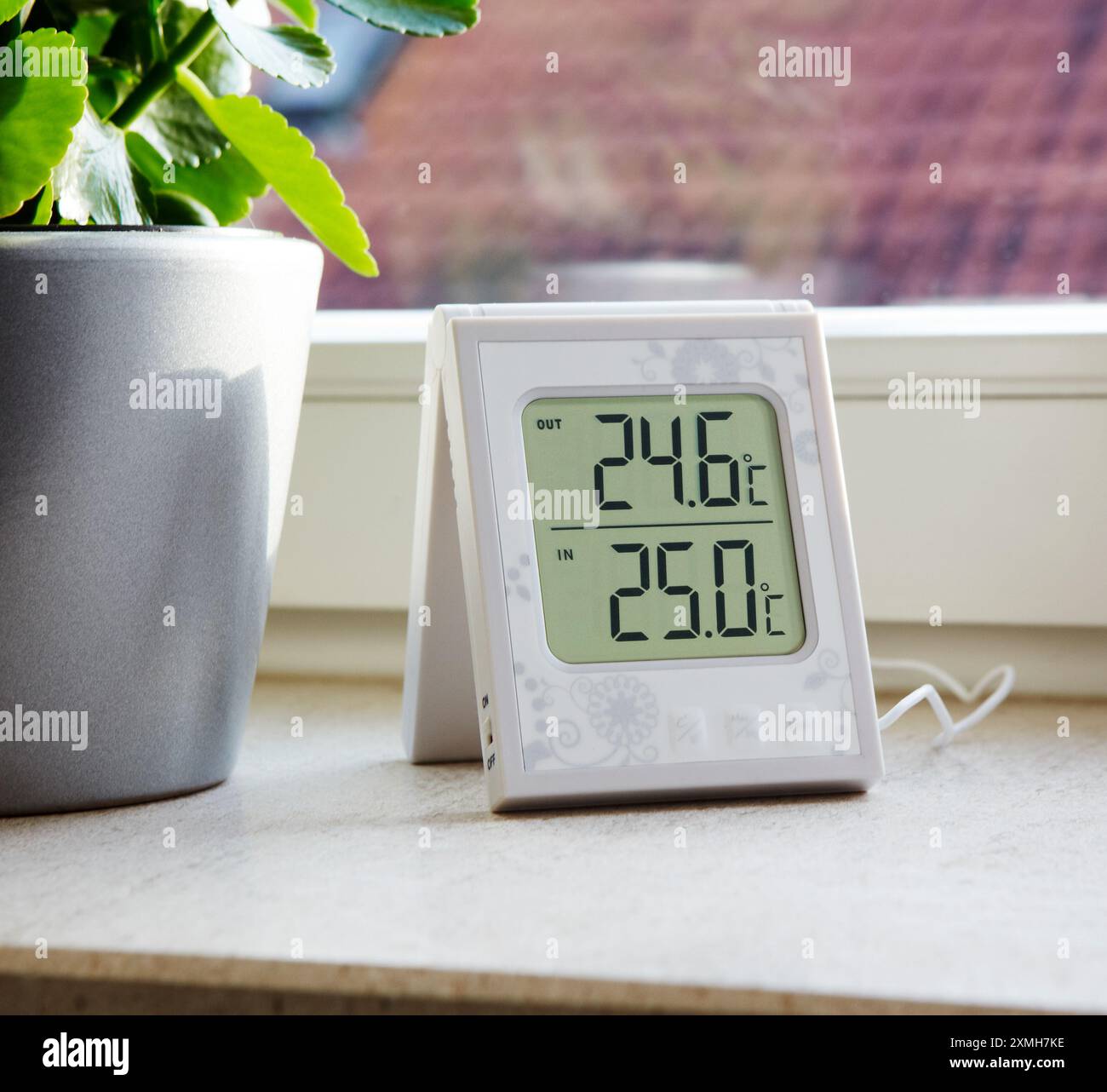 Digital home thermometer with outdoor sensor solar powered Stock Photo ...