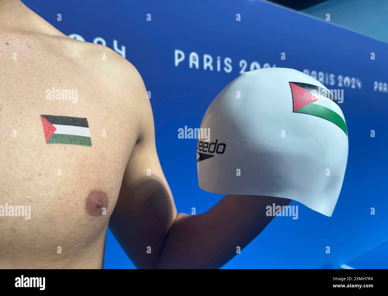 Palestinian swimmer Yazan Al Bawwab poses with his swim cap at Paris La ...