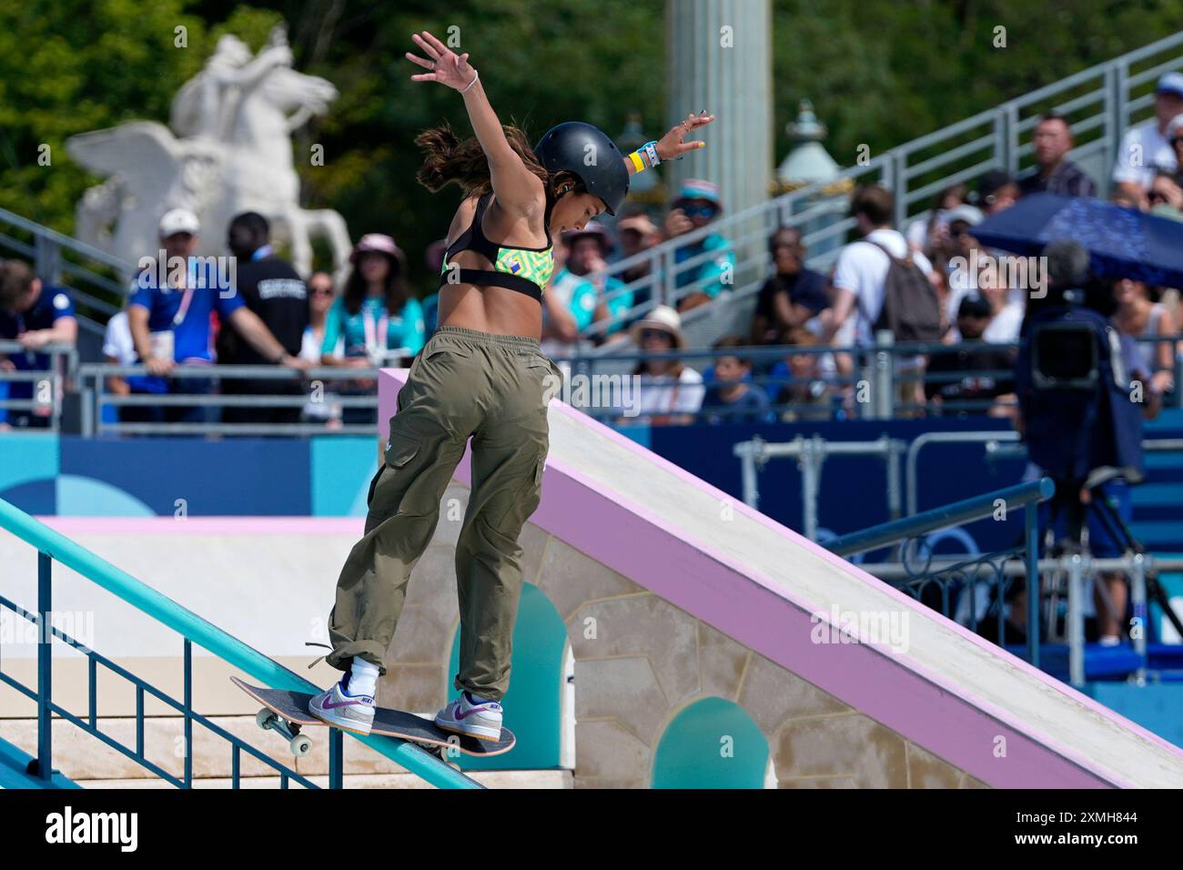 Rayssa Leal, of Brazil, performs a trick during the women's skateboard ...