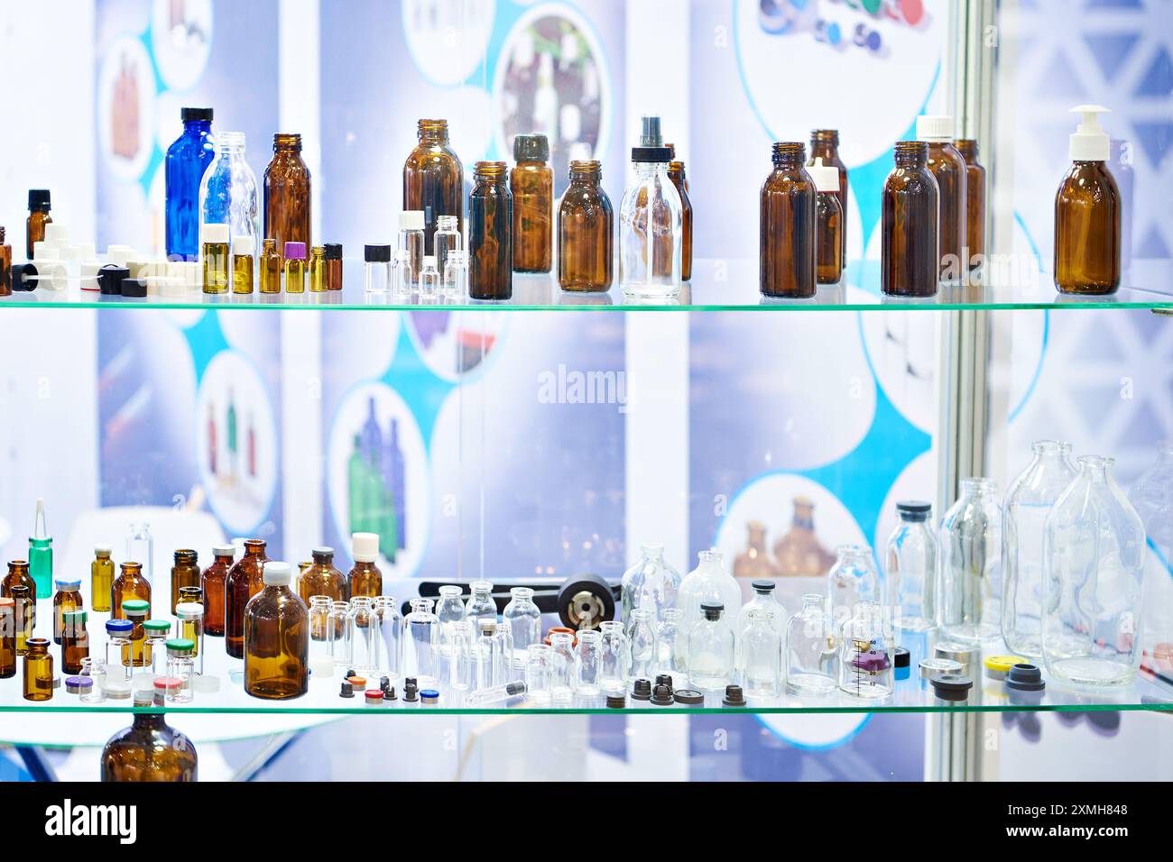 Laboratory glass dishes, bottles, jars and flasks in store Stock Photo ...