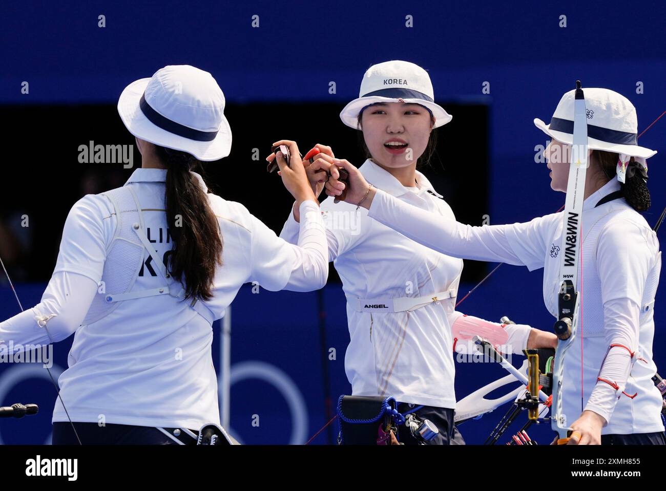 South Korea's Nam Su-hyeon, center, greets her teammates, Jeon Hun ...