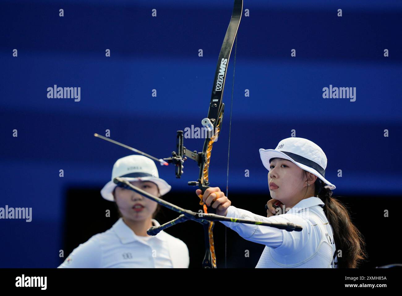 South Korea's Lim Si-hyeon, shoots during the women's team ...