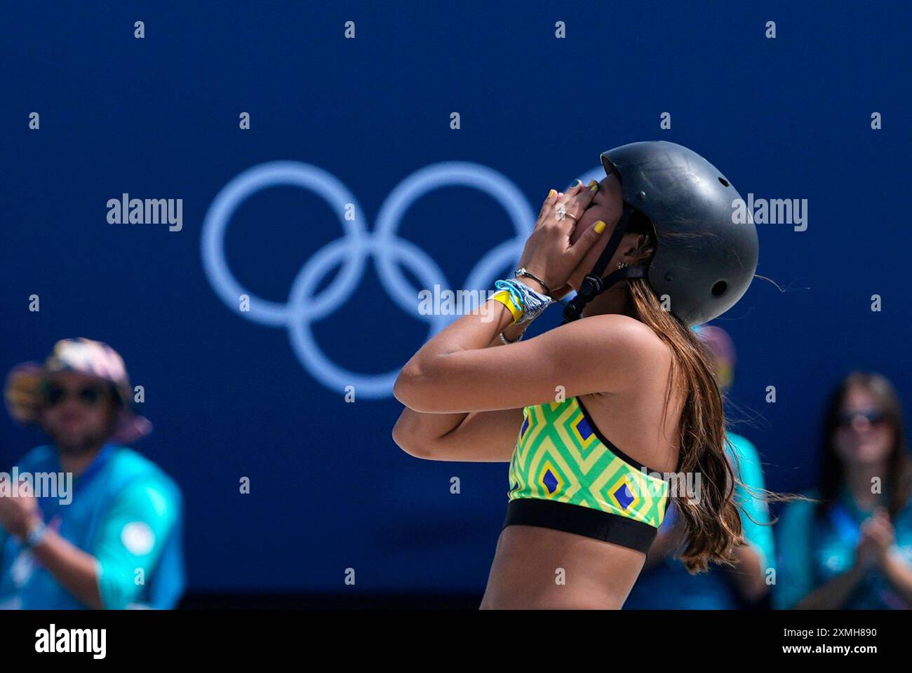 Rayssa Leal, of Brazil, reacts after landing a trick during the women's ...