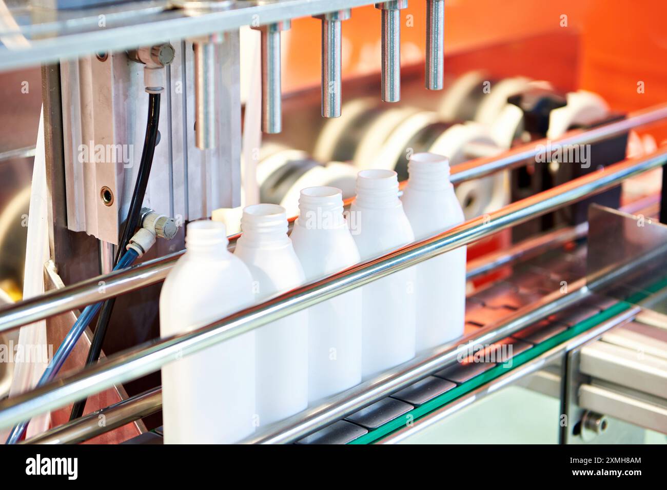 Production process conveyor plastic bottles hi-res stock photography ...