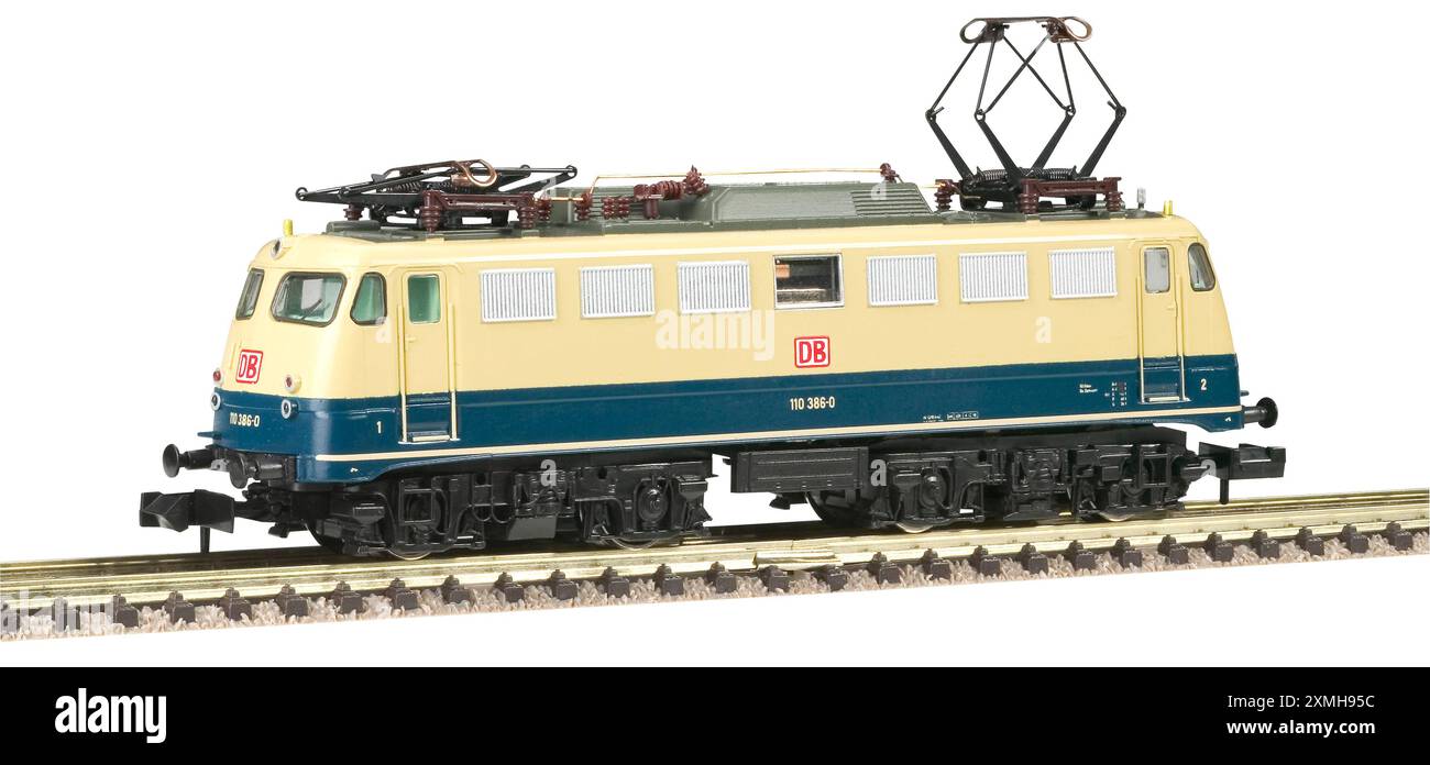 Electric locomotive engine and tracks model railway cut out still life ...