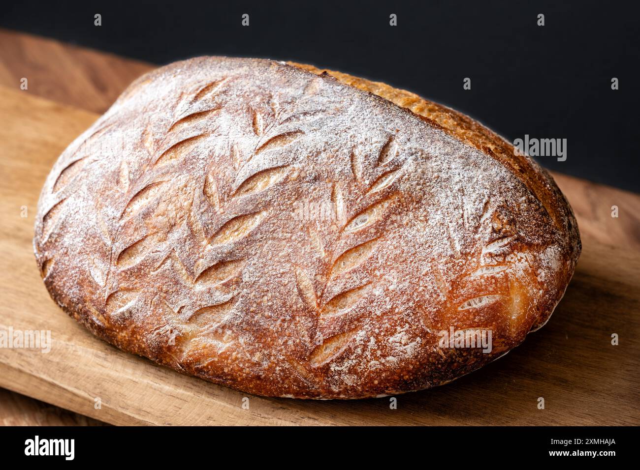 UK. A loaf of freshly baked homemade traditional sourdough bread. The ...