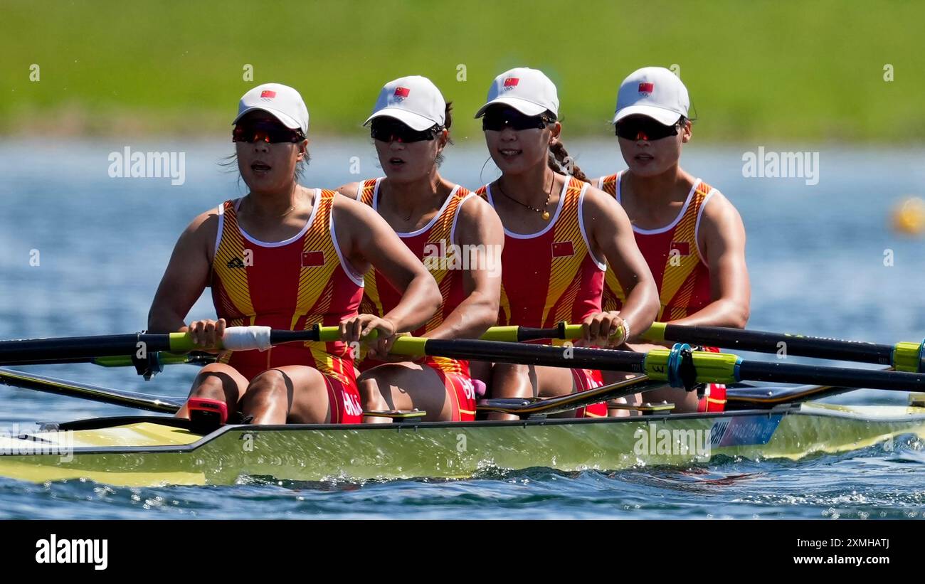 China's Liu Xiaoxin, Liu Xiaoxin, Wang Zifeng and Xu Xingye compete in the women's rowing four ...