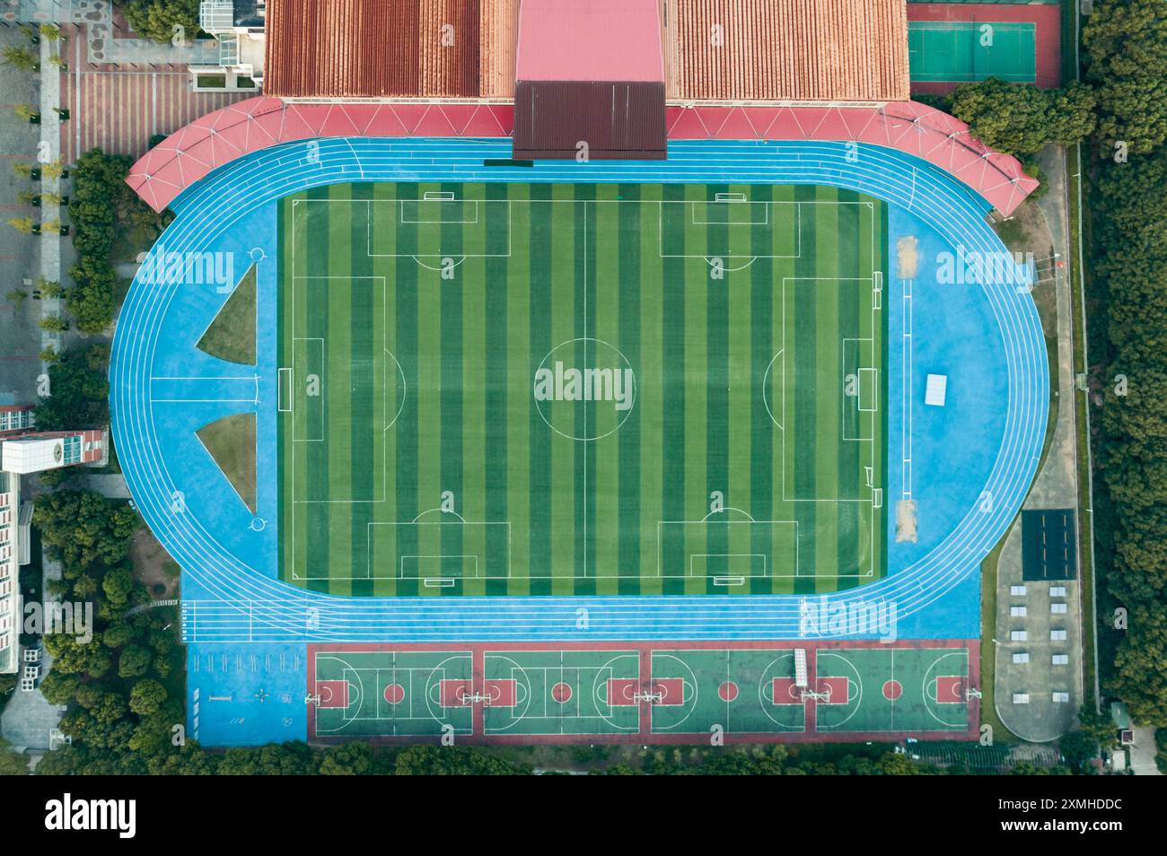 Aerial view of a multi-sport facility featuring soccer and basketball ...