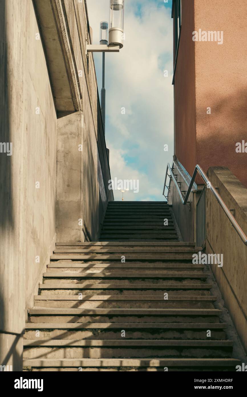 View of stairs between buildings Stock Photo - Alamy