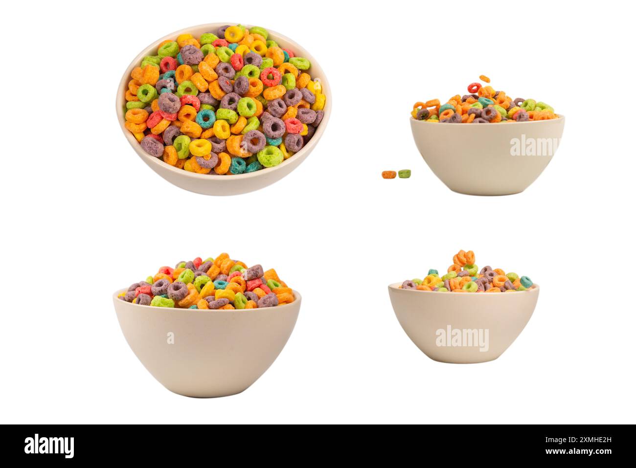 Colorful rings cereal spill out into a bowl. Breakfast. Isolated on a ...