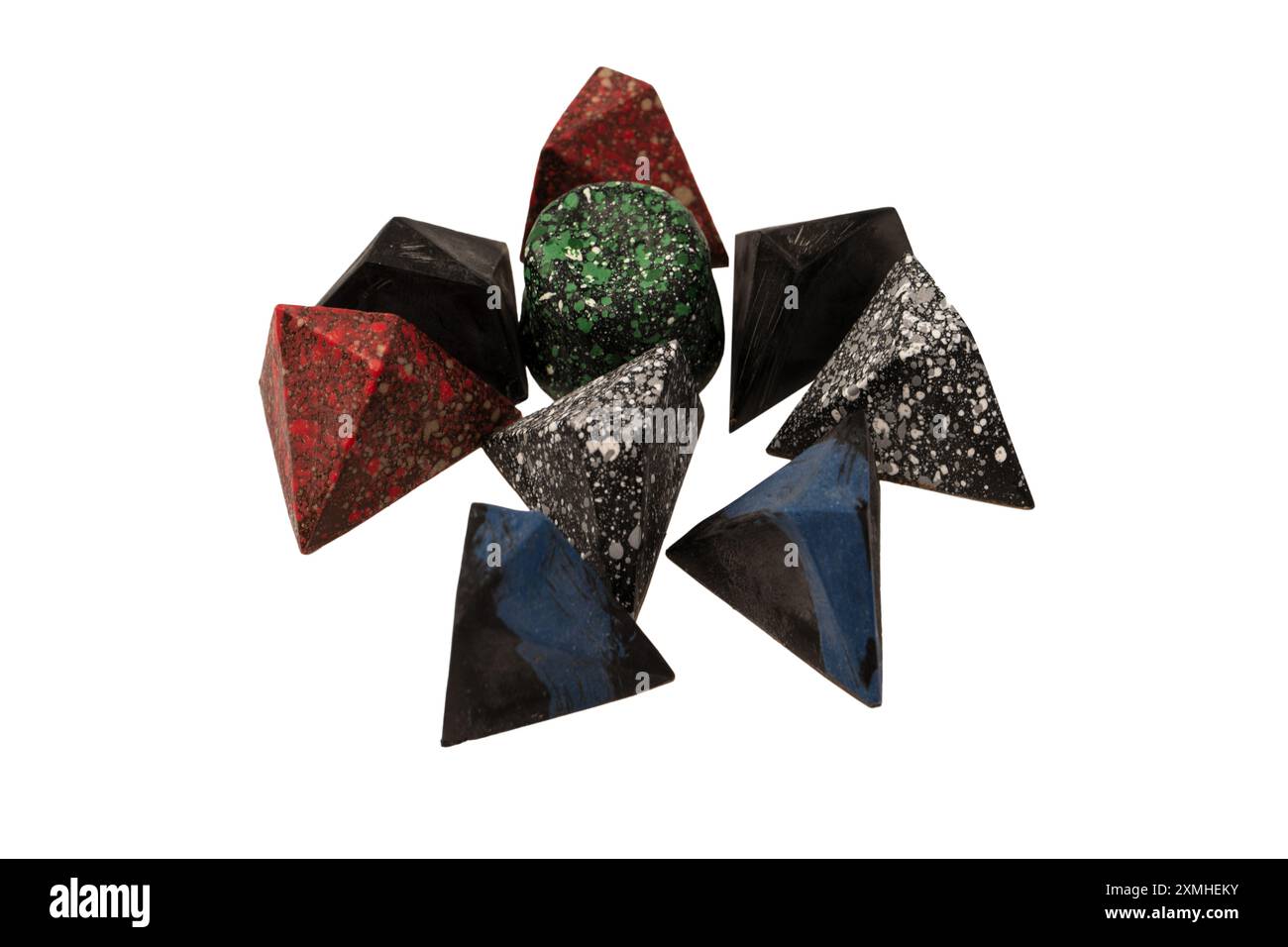 Chocolate candies in the form of precious stones, with marble texture ...