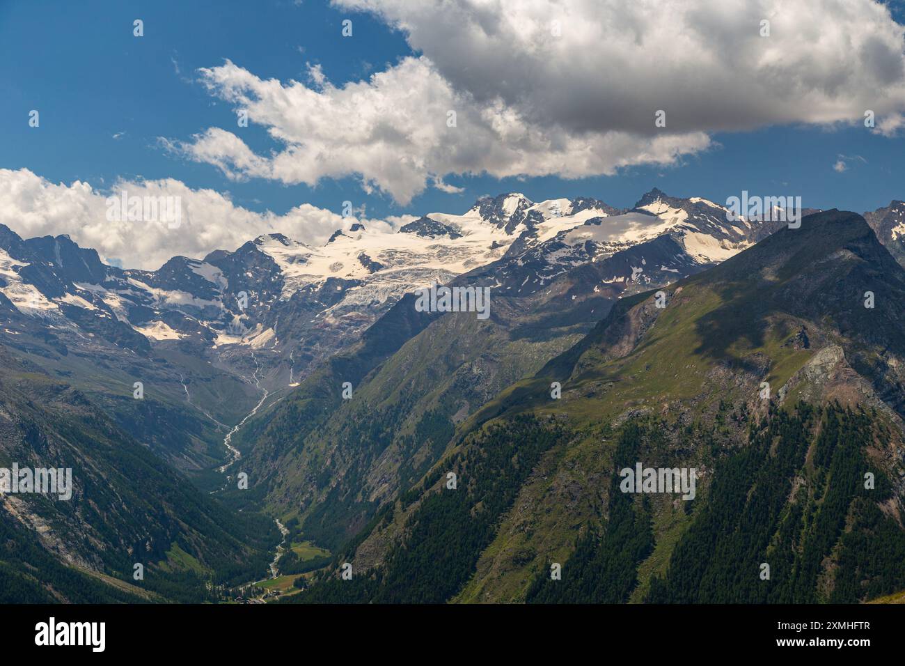 The beautiful valley in front of the Gran Paradiso in a summer day ...