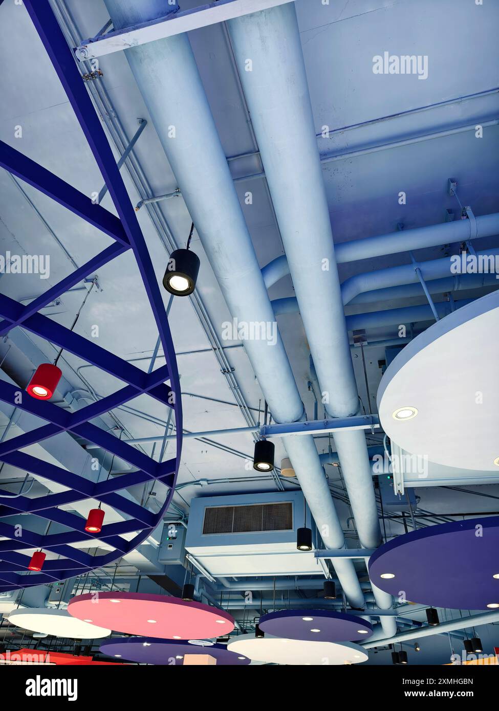 Ceiling with ventilation pipes and lights in industrial building Stock ...