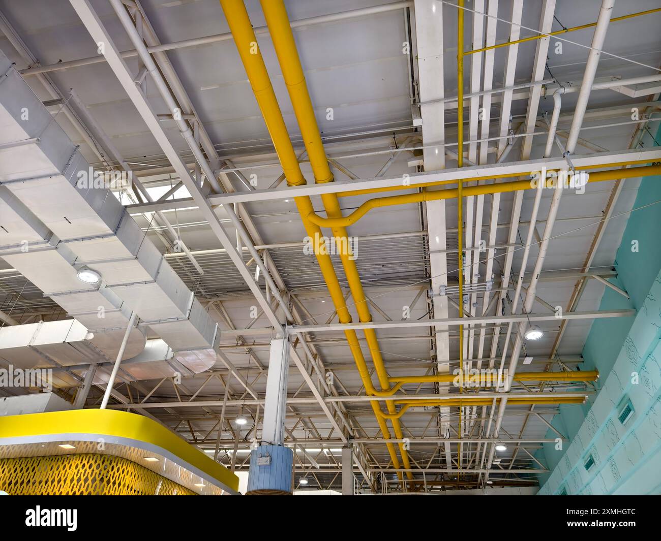 Ceiling with ventilation pipes and lights in industrial building Stock ...
