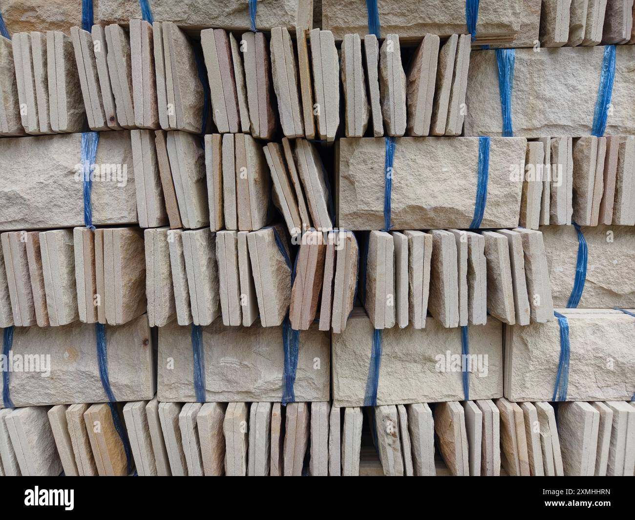 Brick stack tied with ropes for construction and building purposes ...
