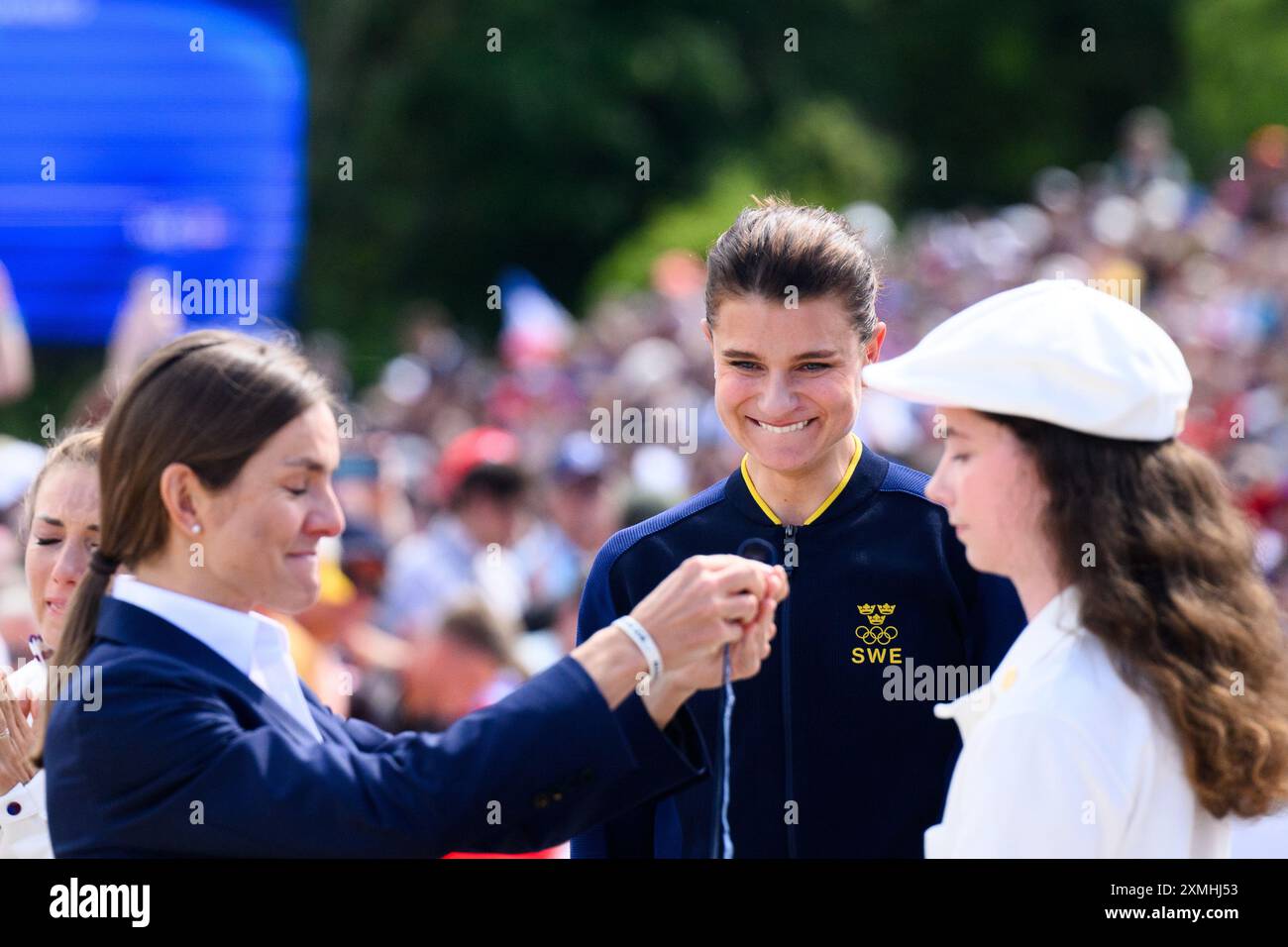 Jenny Rissveds of, Sweden. , . receives her bronze medal after women's cross-country mountain ...