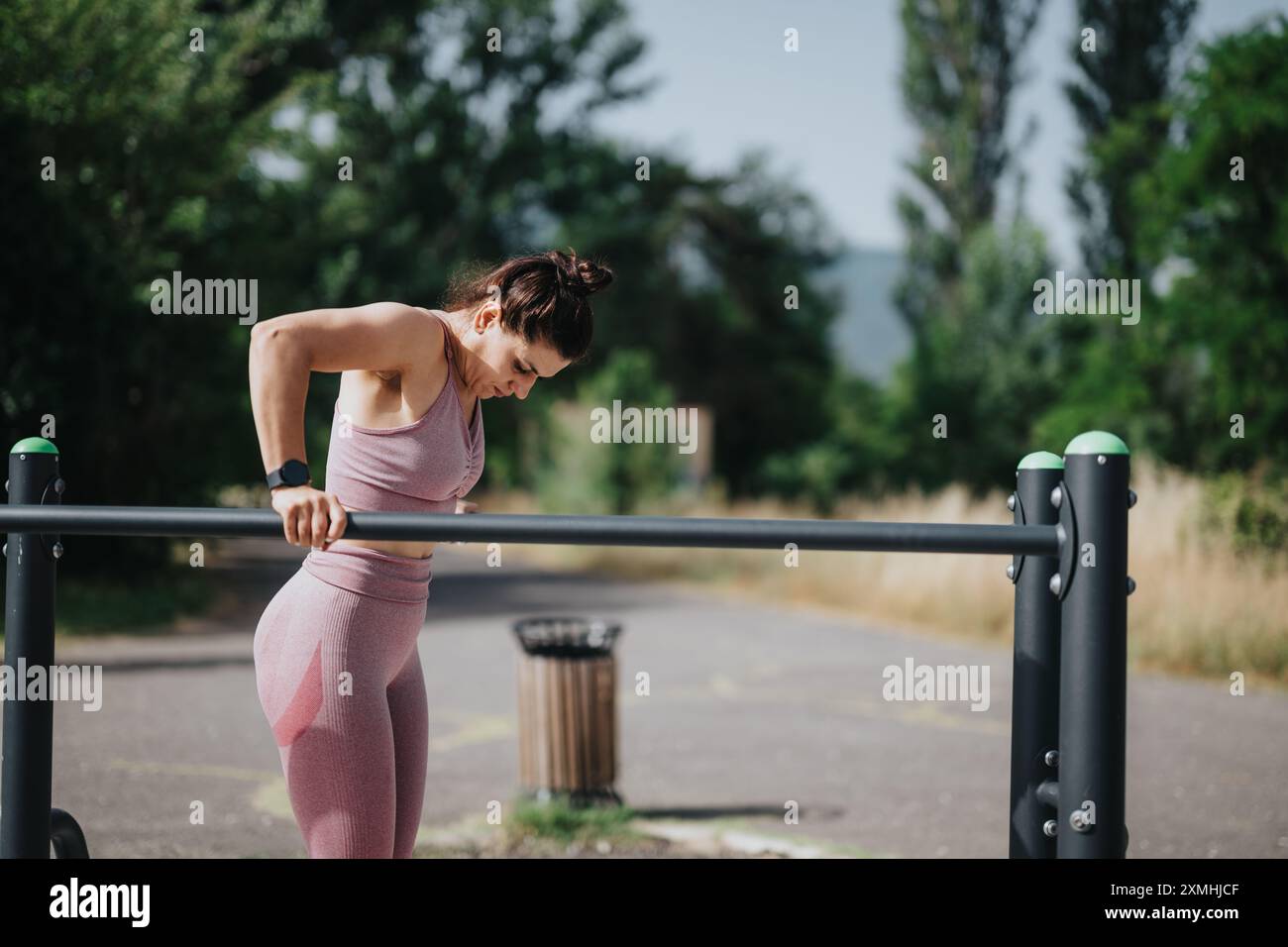 Woman performing calisthenics on hi-res stock photography and images ...