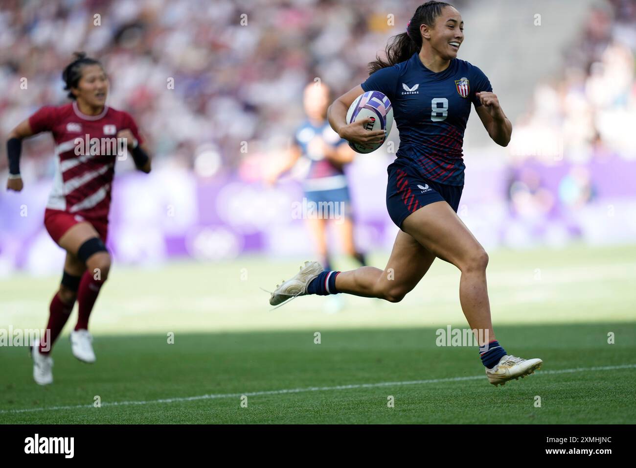 United Staes Alex Sedrick runs onto score a try during the women's Pool ...