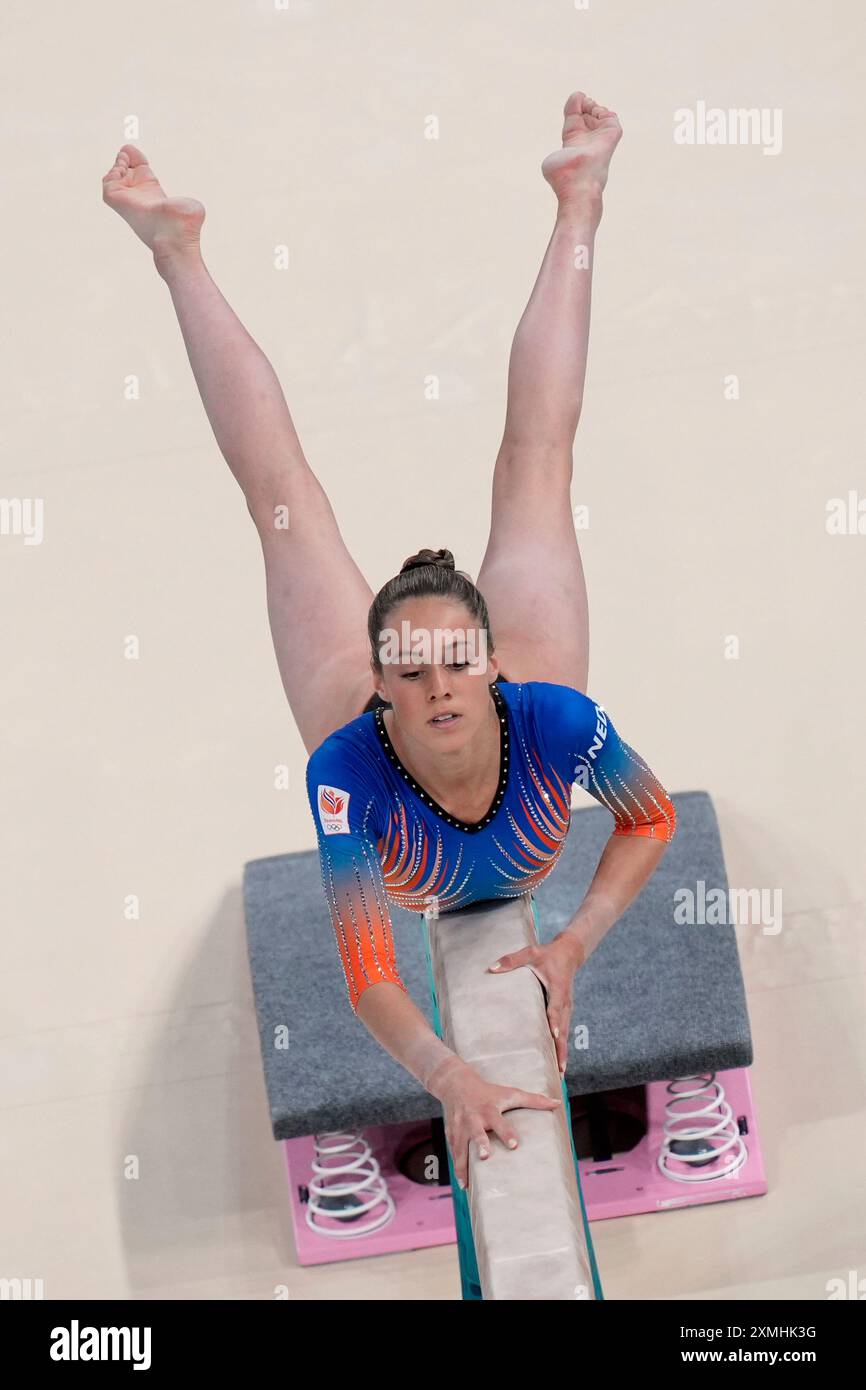 Naomi Visser, of Netherlands, competes on the balance beam during a ...