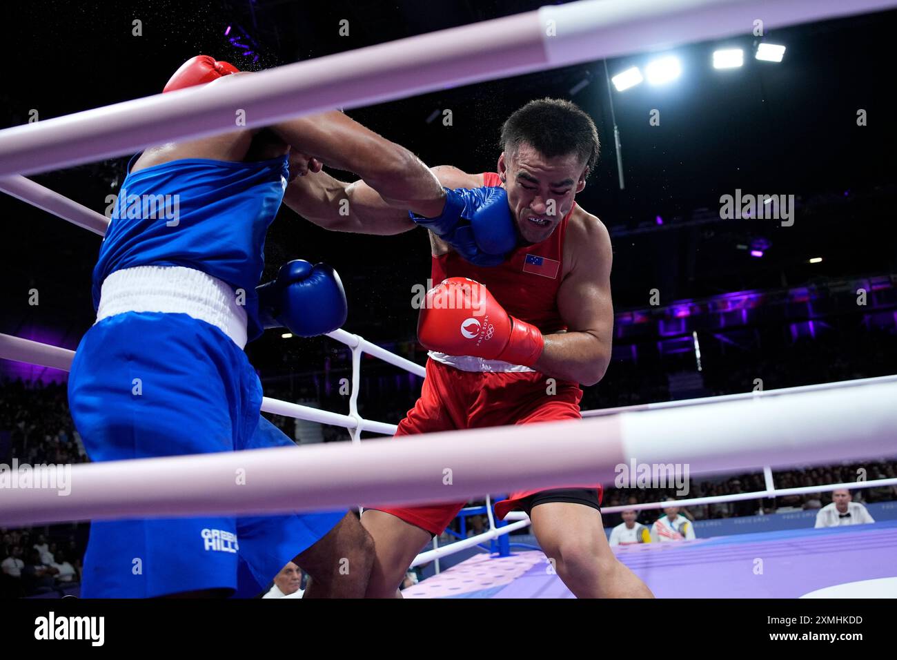 Samoa's Ato Plodzicki-Faoagali, right, fights Belgium's Victor ...