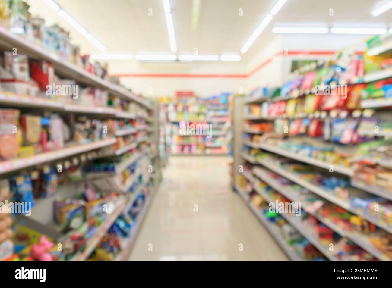 convenience store shelves interior blur for background Stock Photo - Alamy