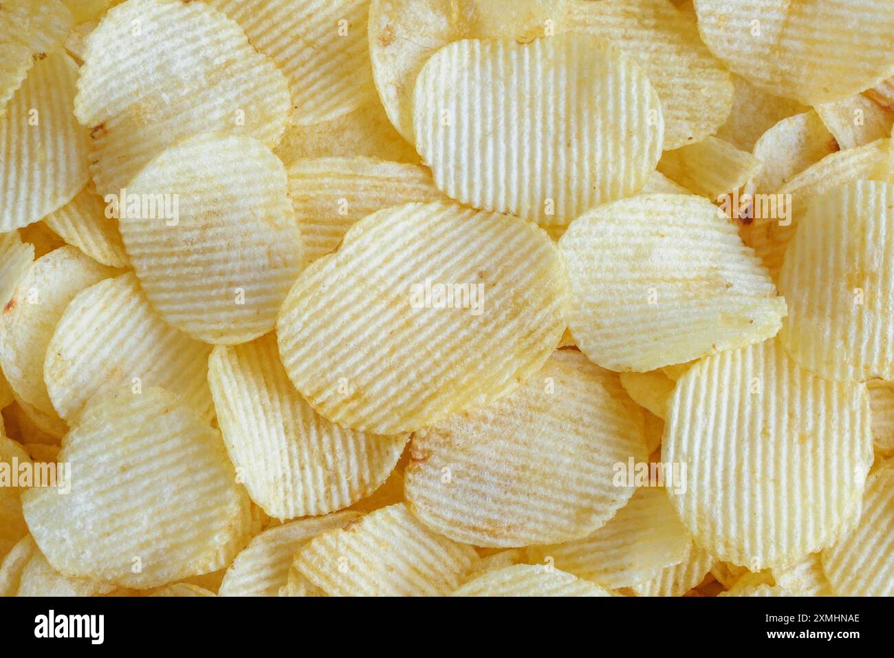 crispy potato chips snack texture background Stock Photo - Alamy