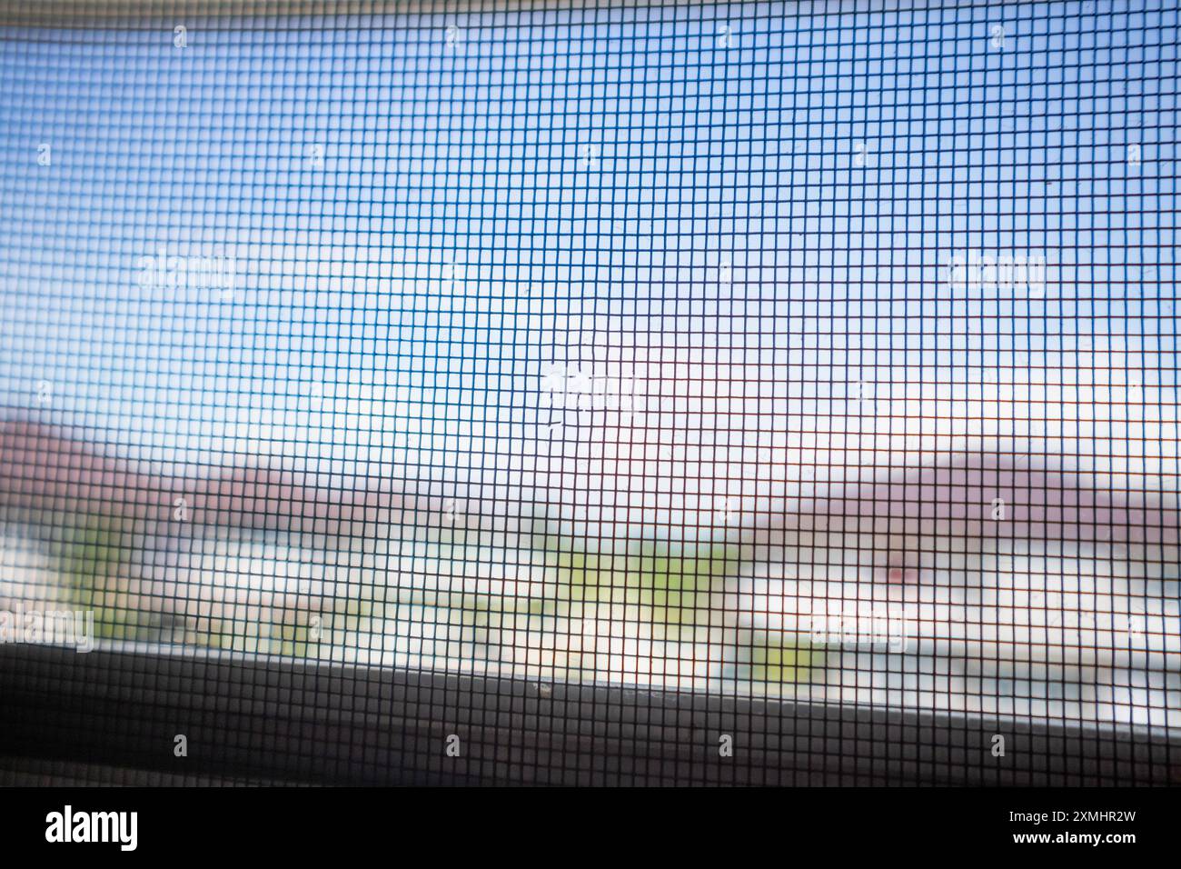 damaged mosquito net wire screen on house window protection against ...