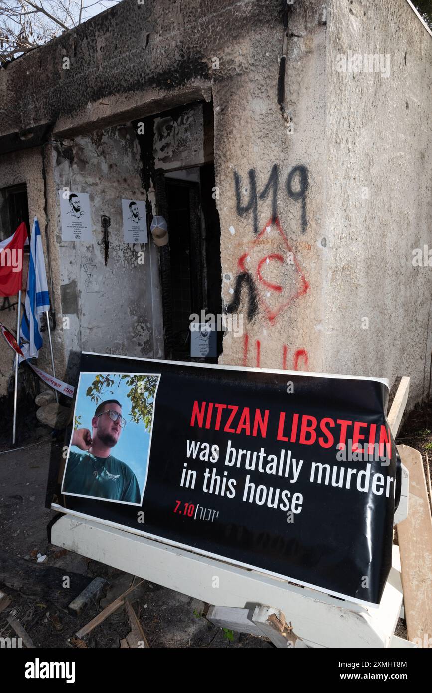 A sign marking the death of Nitzan Libstein, a resident of Kibbutz Kfar ...