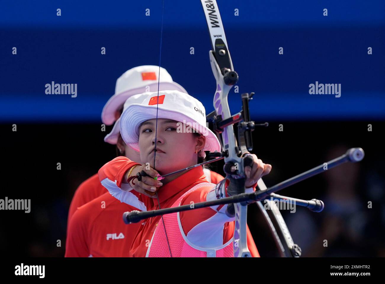 China's LI Jiaman shoots during the Archery women's team gold medal ...