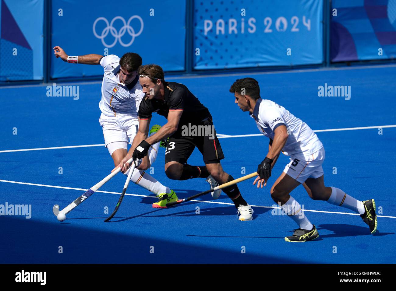 Germany's Paul Philipp Kaufmann, center, and Spain's Marc Reyne, left ...