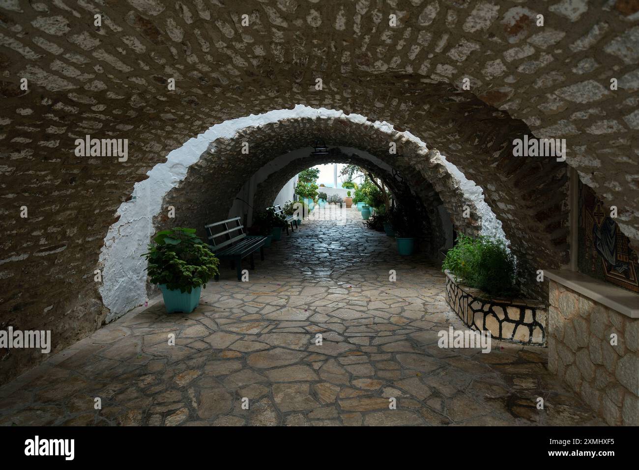 View under the arches of the monastery Stock Photo - Alamy