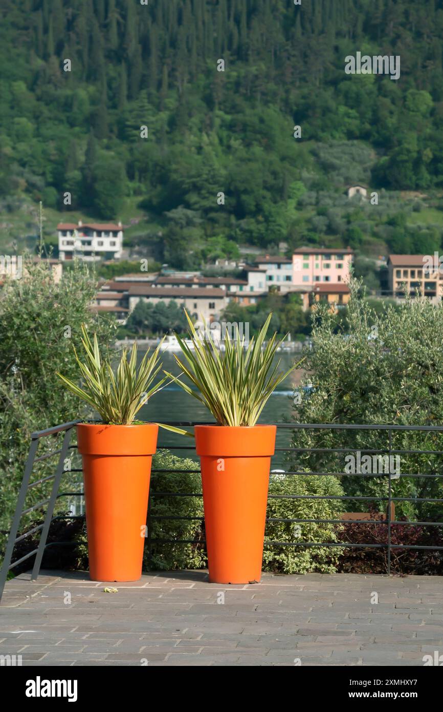Two large plant pots on the balcony of a building on the island Stock ...