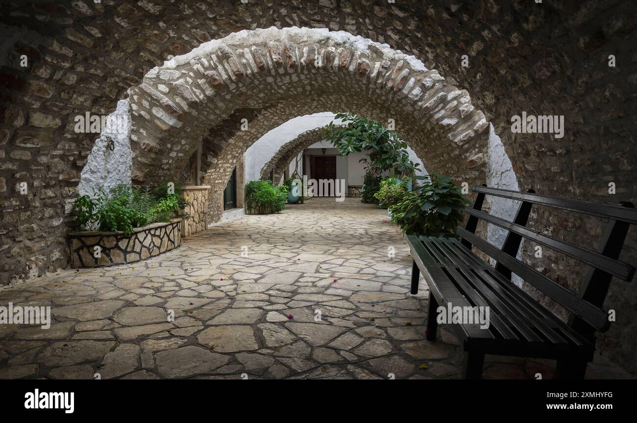 View under the arches of the monastery Stock Photo - Alamy