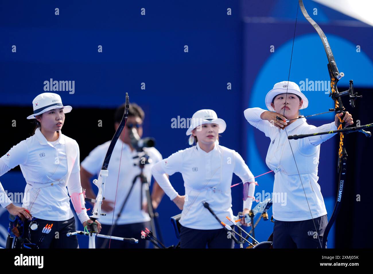 South Korea's Lim Si-hyeon shoots during the Archery women's team gold ...