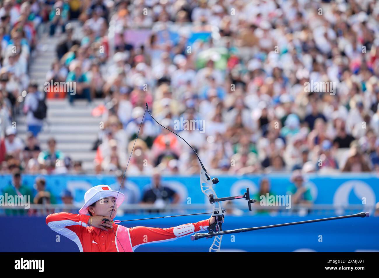 China's LI Jiaman shoots during the Archery women's team gold medal ...