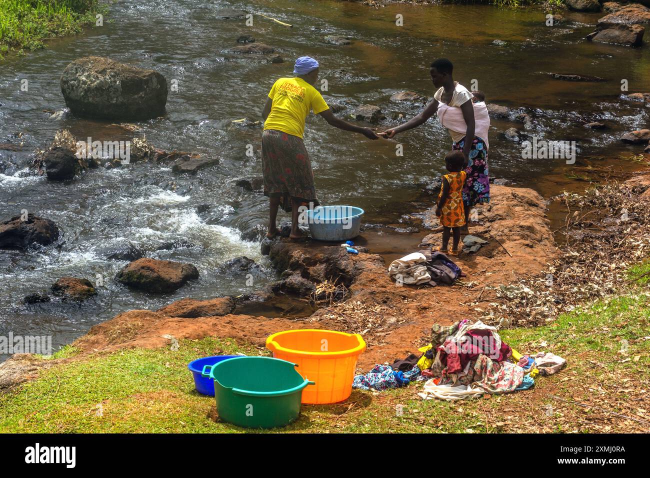 SIPI, UGANDA - FEBRUARY 28, 2020: Local women doing laundry in Sipi ...