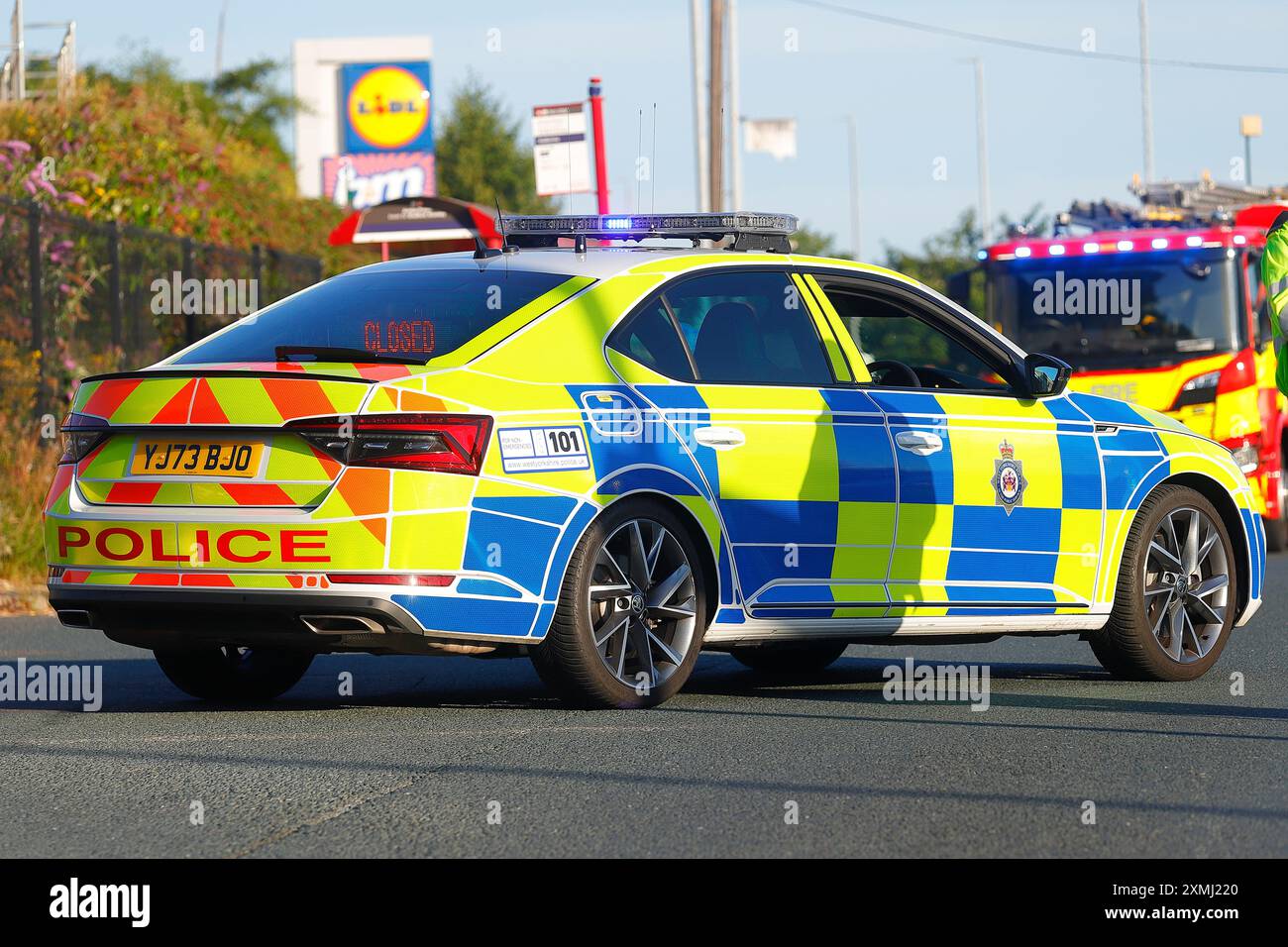 Vehicles from West Yorkshire Police Force used as roadblocks at a fire ...