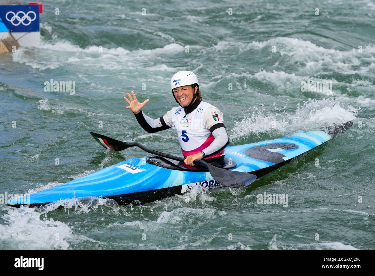 Stefanie Horn of Italy reacts at the finish area of the women's kayak ...