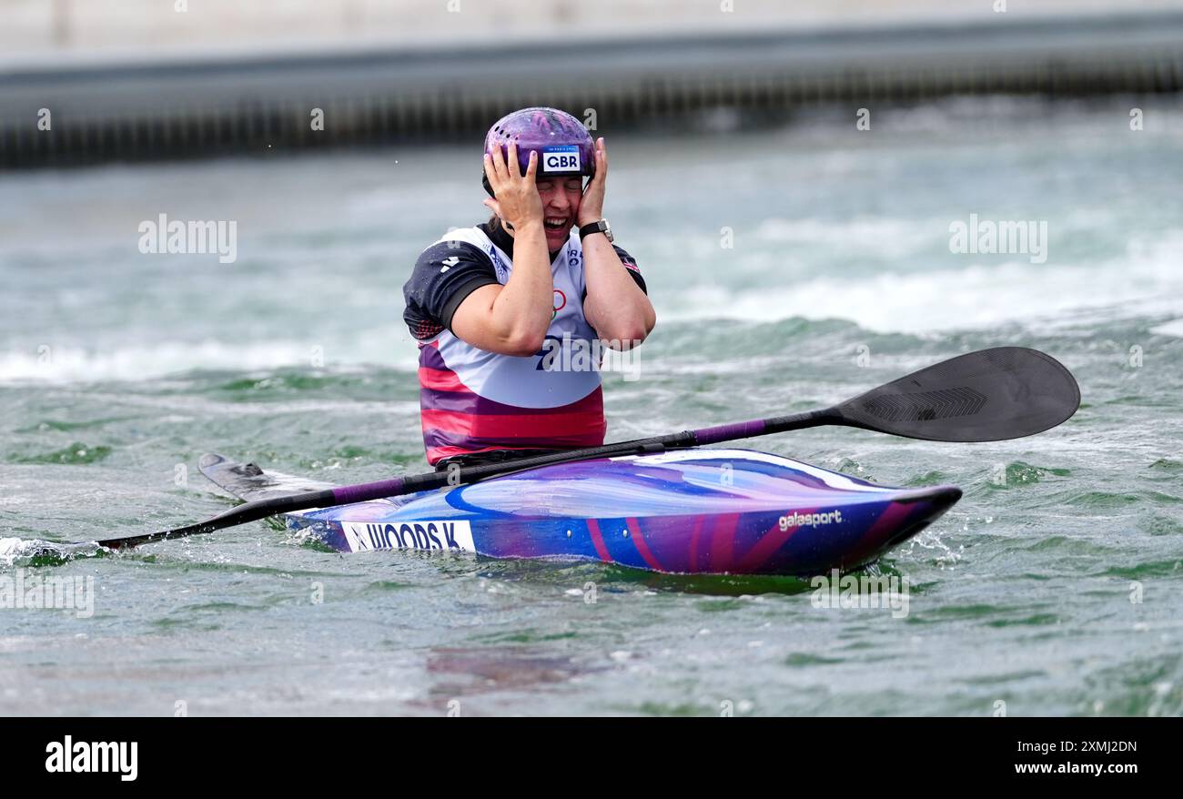 Great Britain's Kimberley Woods reacts as she crosses the finish line ...